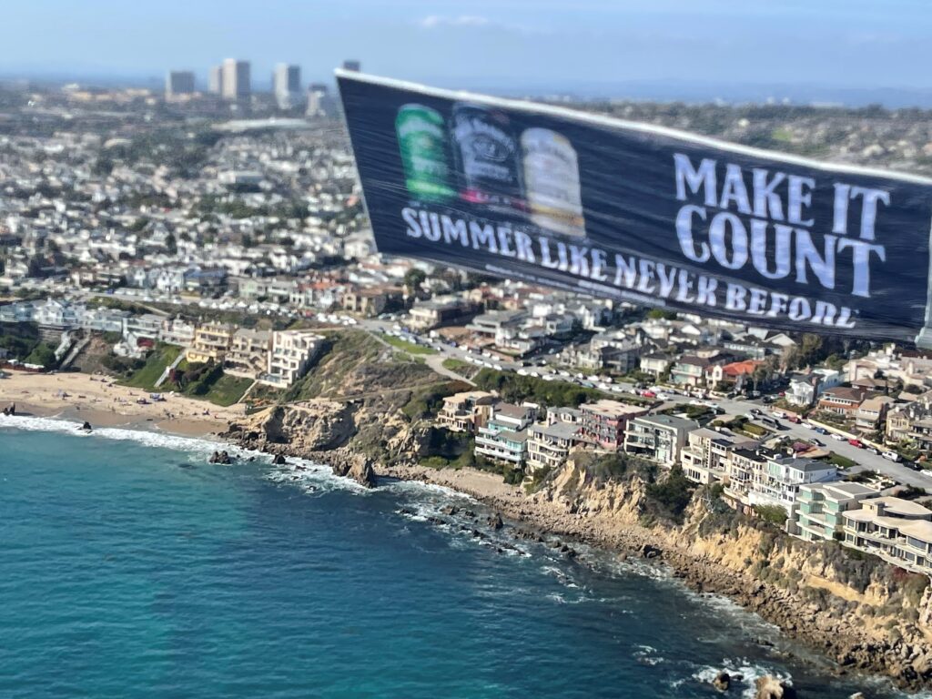 Sky-High Brand Visibility: Aerial Ad Secrets | Airsign Aerial ...